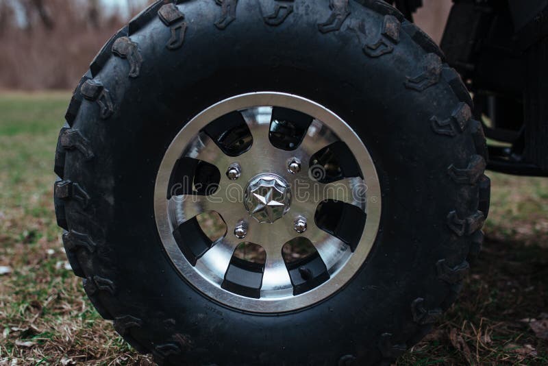 ATV Wheel. Sport and Travel Concept Stock Photo - Image of grass, bike ...