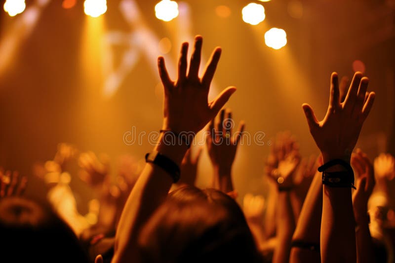 Audience with Hands Up, Lit by Stage Lights Stock Image - Image of ...