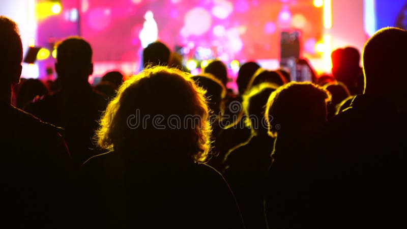 Audience of Night Live Show and Bright Stage Lighting. 4K Shot Stock ...