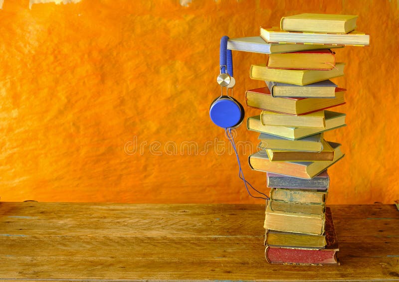 Audio Book Concept, with Stack of Books, and Headphones,negative Space ...