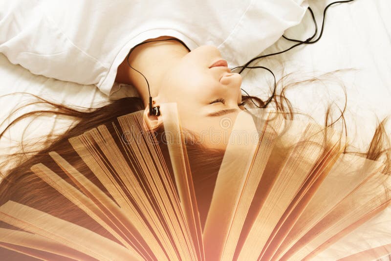 Audio Book is Playing in the Headphones of the Girl Stock Photo - Image ...