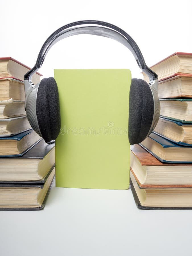 Audio Book Stack of Hardback Books and Electronic Reader. Electronic ...