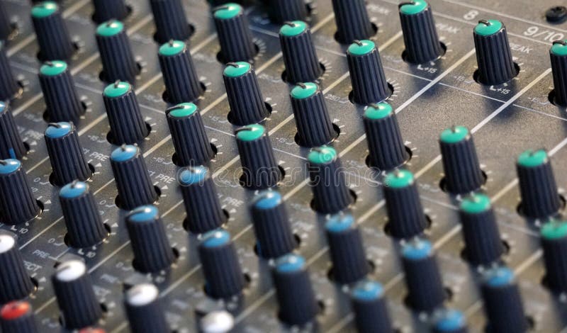 Audio console knobs stock photo. Image of metallic, green - 156183286