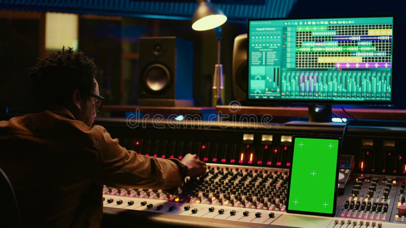 Audio Expert Processing Sounds Next To Tablet with Isolated Mockup ...