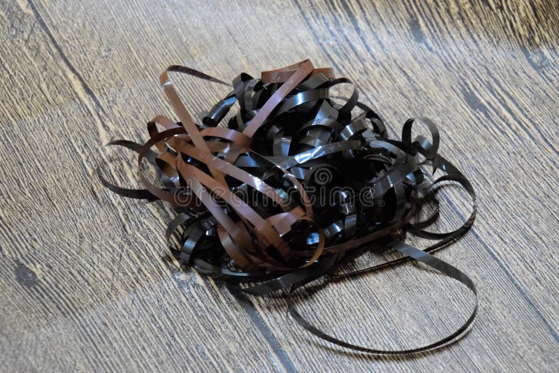 Audio Film on the Table. a Magnetic Film Pulled Out of a Broken ...
