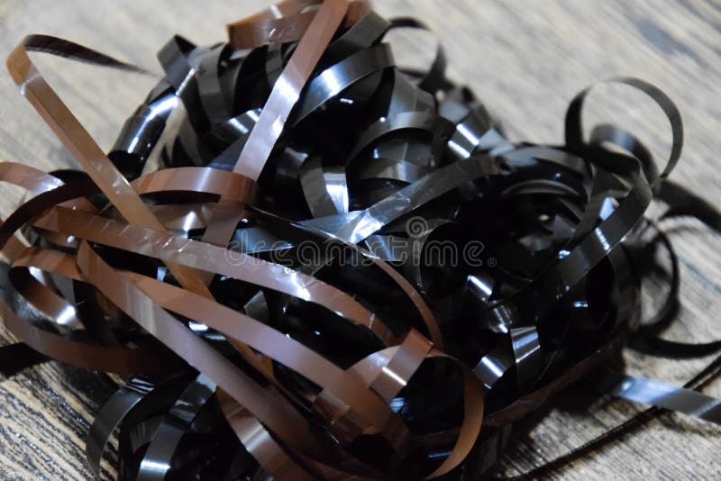 Audio Film on the Table. a Magnetic Film Pulled Out of a Broken ...