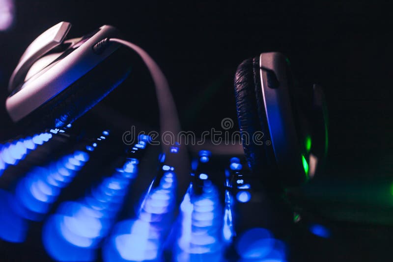 Audio Headphones on the Keyboard Near the Computer Stock Photo - Image ...