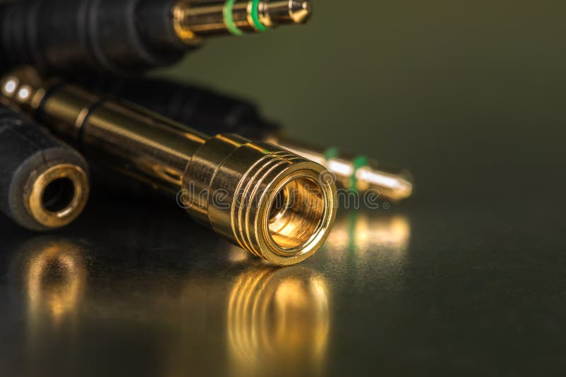 Audio Jack Connectors on a Dark Metalic Surface Stock Image - Image of ...