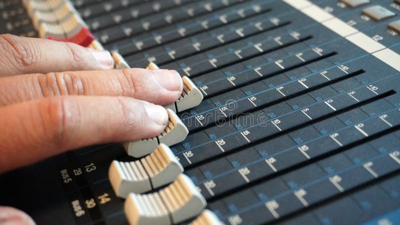 Fingers Moving Audio Console Levers Stock Photo - Image of audio, blue ...