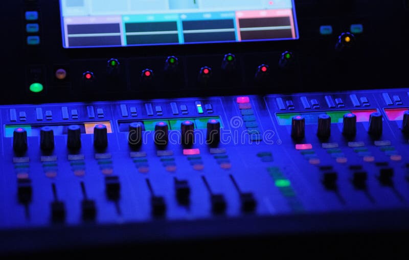 Audio Mixer in Blue Light Lamps Faders and Touchscreen Stock Image ...