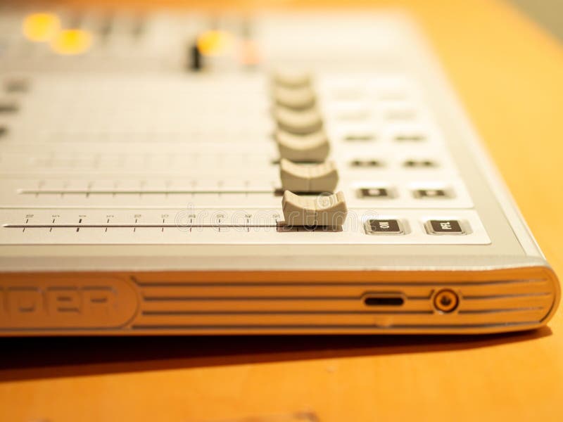 Audio Mixing Console with Sliders and Buttons Captured in a Studio ...