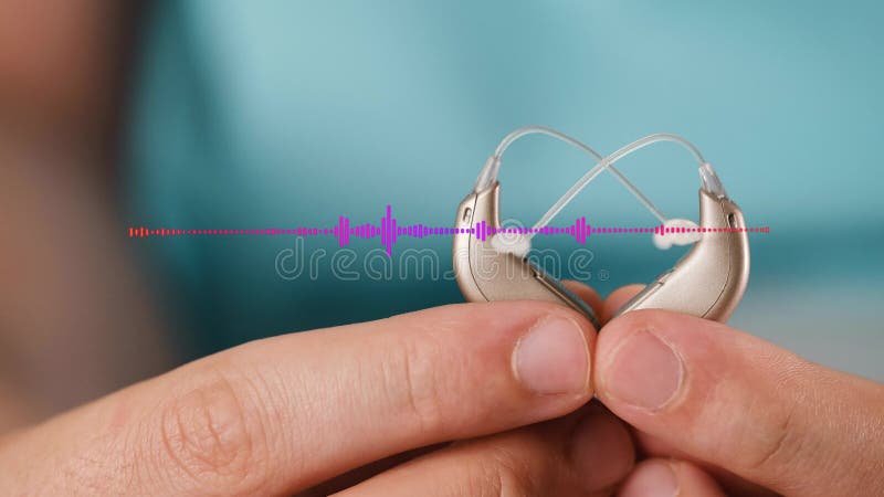 Audio Sound Waves Simulation on Hearing Aids in Hands Making Heart ...