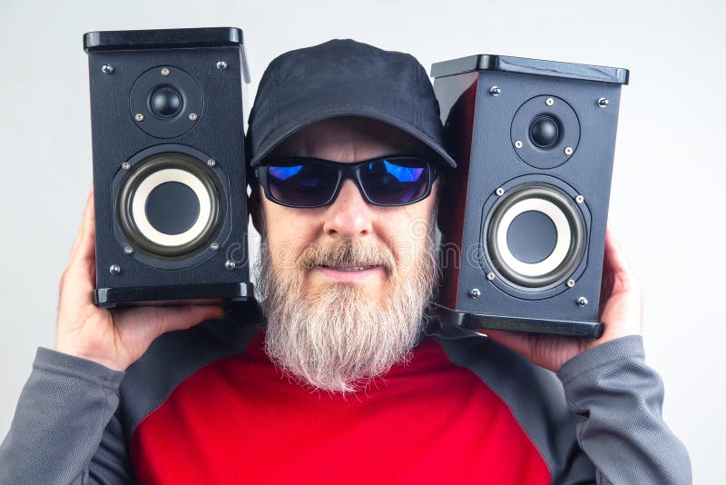 Audio Speakers in the Hands of a Bearded Man. Sound and Modern Media ...