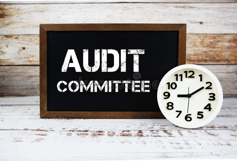 Audit Committee Text Message and Alarm Clock on Wooden Background Stock ...