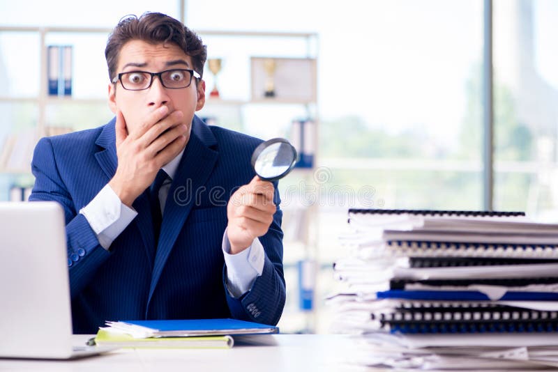 The Auditor Looking for Errors in the Financial Statements Stock Image ...