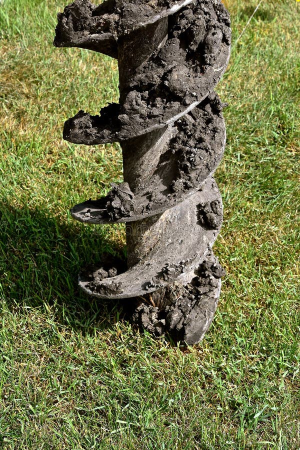 Auger used to dig a hole stock image. Image of machinery - 190387675