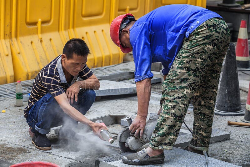 Migrant Workers Working on Construction Site Editorial Photo - Image of ...