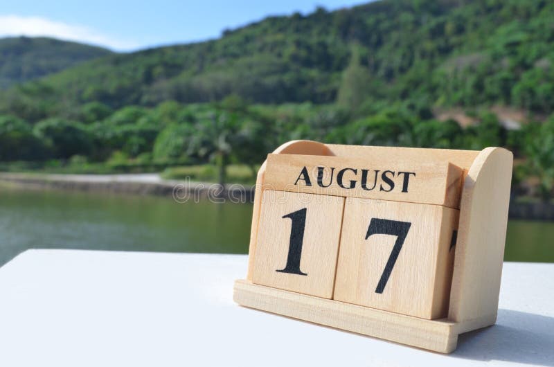 August 17, Date Design with Number Cube on White Table, Cover Design in ...