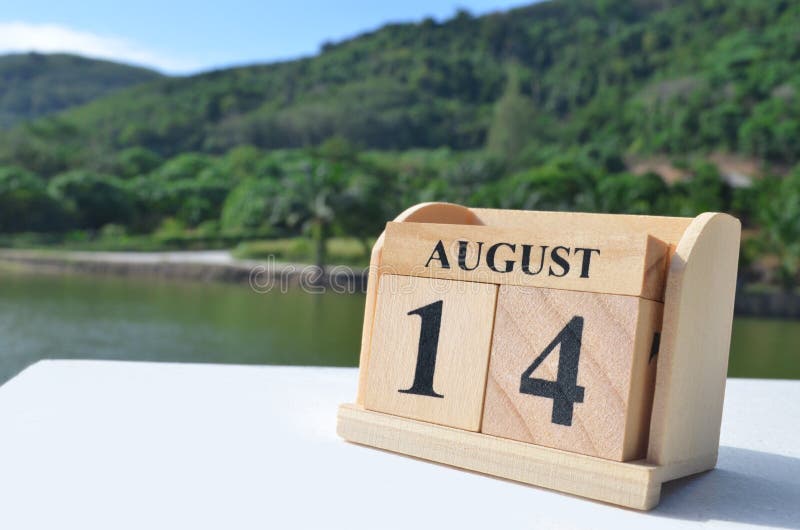 August 14, Date Design with Number Cube on White Table, Cover Design in ...