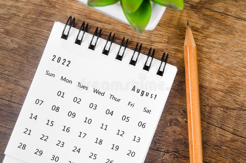 August 2022 Desk Calendar with Wooden Pencil on Wooden Table Stock ...
