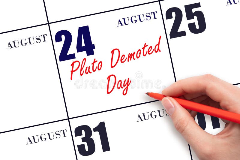 August 24. Hand Writing Text Pluto Demoted Day on Calendar Date Stock ...