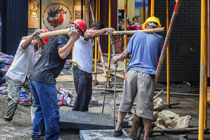 Migrant workers working editorial image. Image of workers - 135504545
