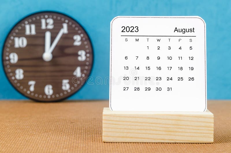 The August 2023 Monthly Calendar Year with Alarm Clock on Gray Colour ...