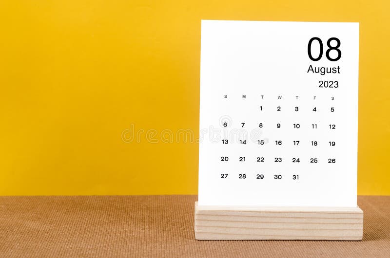 The August 2023 Monthly Calendar for 2023 Year on Yellow Table Stock ...