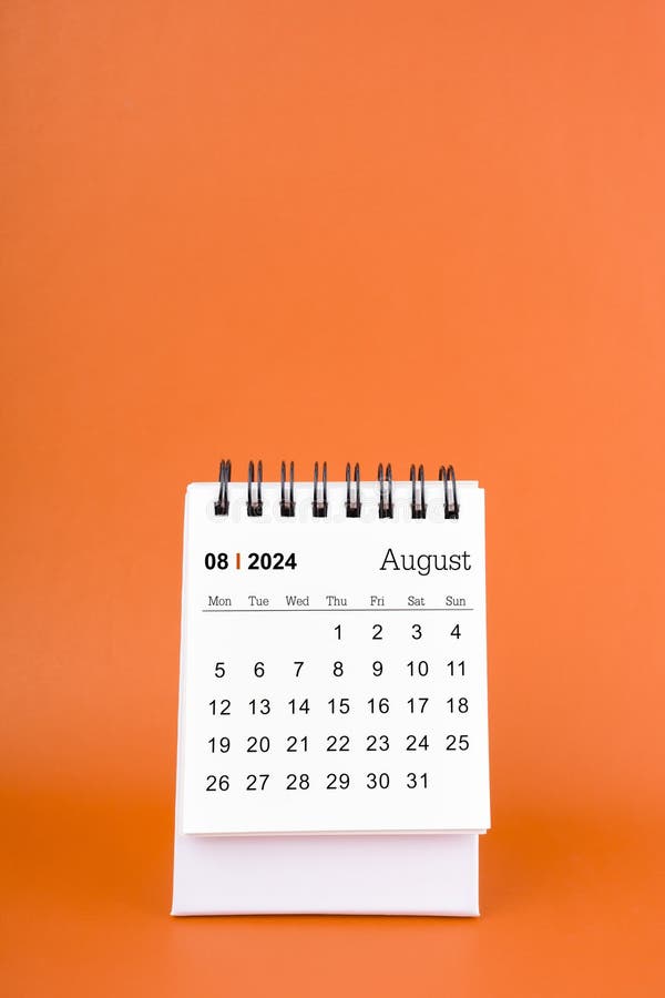 August 2024 Table Calendar on Orange Color Background Stock Photo ...