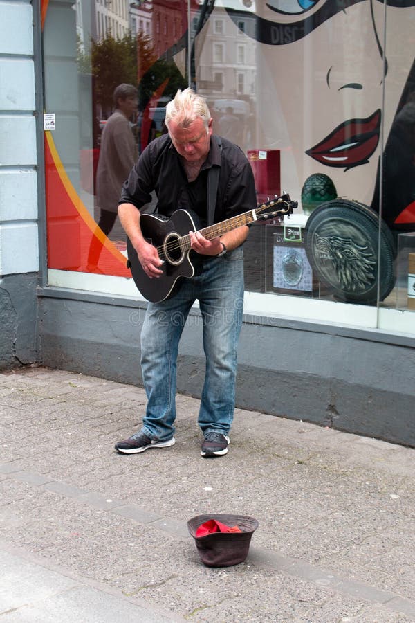 People Busking Near the Pubs in the Small Port Town on the Southwest of ...