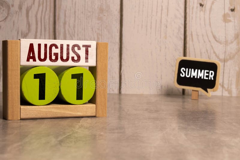 August 11th. August 11 Wooden Cube Calendar with Blur Objects on ...