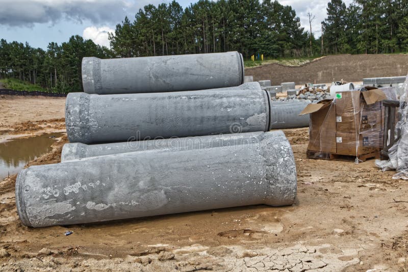 Construction Site Stacks of Concrete Sewage Tubing Front View Stock ...