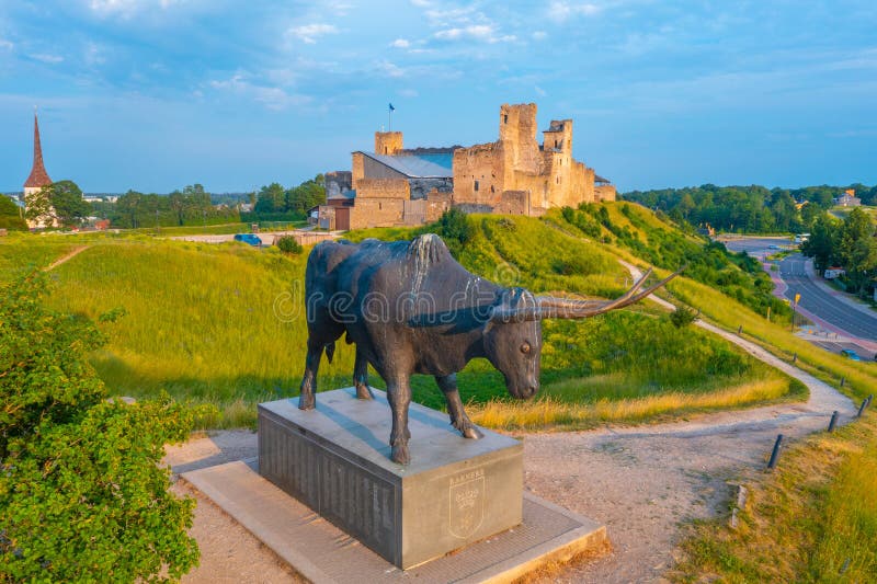 Aurochs Statue with Rakvere Castle in Background, Estonia Editorial ...
