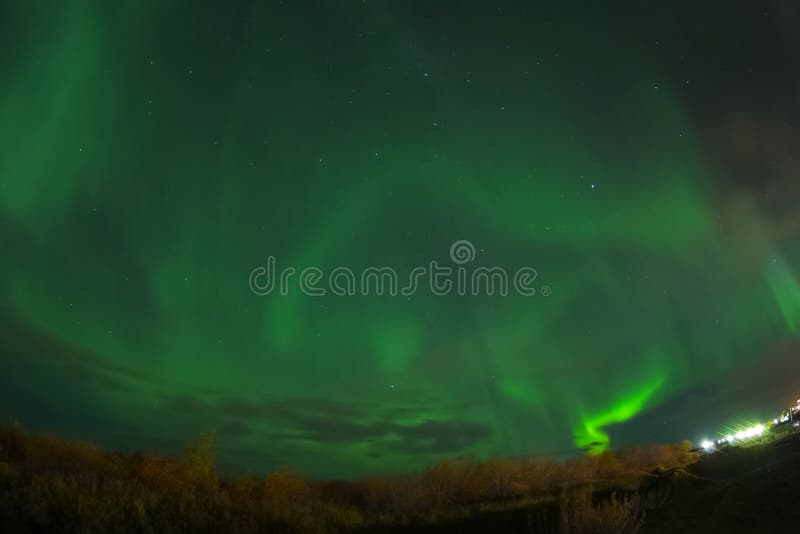 Aurora Borealis in Night Northern Sky. Ionization of Air Particles in ...