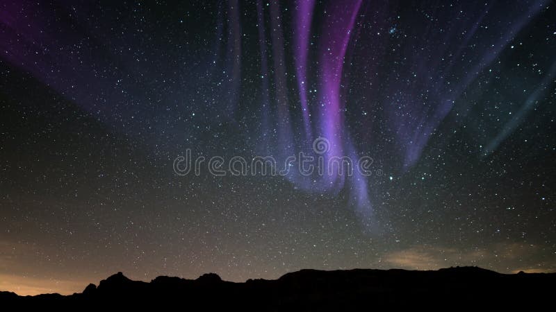 Aurora Glowing Purple and Milky Way Galaxy Horizon Loop Stock Footage ...