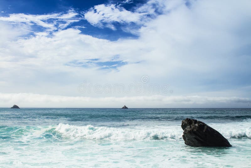 Austere rock ocean scene stock photo. Image of ocean - 60176050