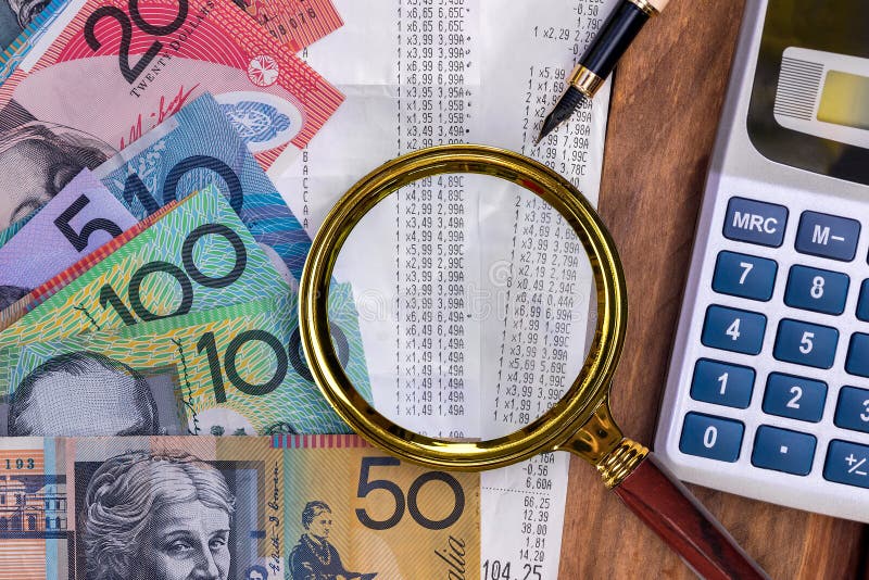 Australian Dollars with Receipt, Calculator, Pen and Magnifier Stock ...