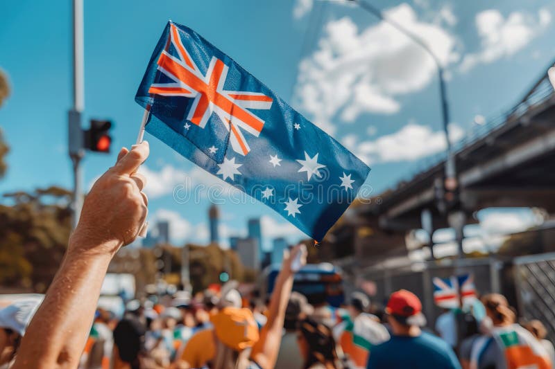 Australian Flag Celebration at Outdoor Event with Crowd and Sunny Sky ...