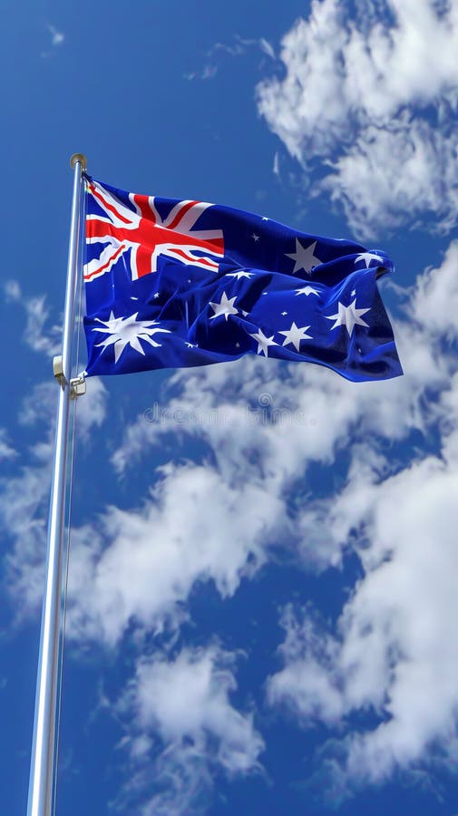 Australian Flag Waving Proudly Against a Cloudy Blue Sky Stock ...