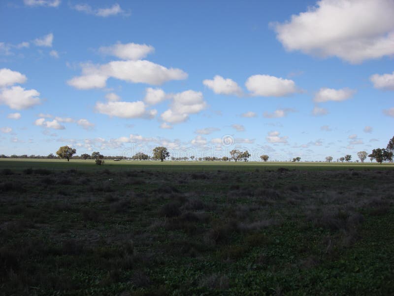 Small Clouds Above the Grass Paddocks Stock Photo - Image of hill ...