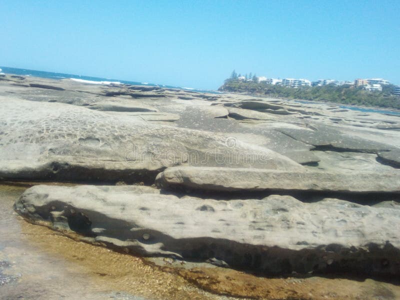 Australian Sunshine Coast Beach with Volcanic Rock in the Foreground ...