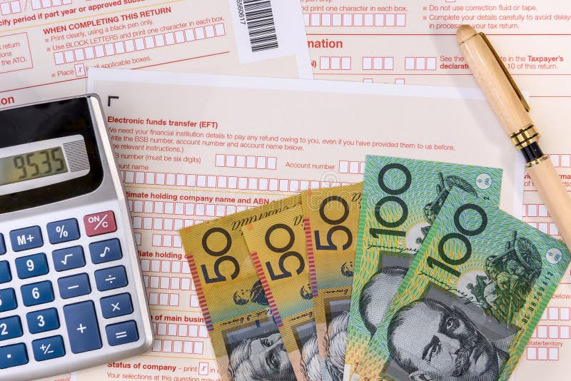 Australian Tax Form with Pen, Calculator and Australian Dollars Stock ...