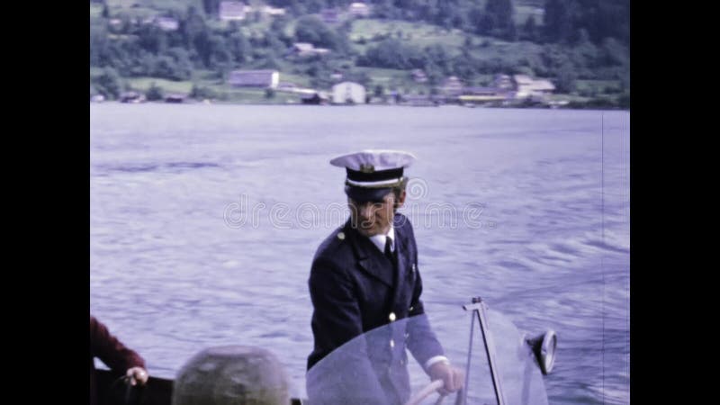 Austria 1971, Small Boat Captain Navigates Lake Stock Footage - Video ...