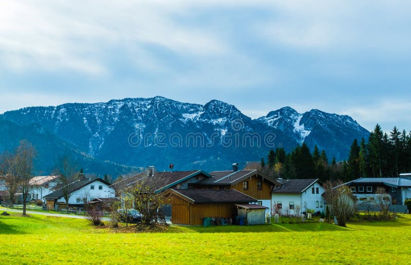 Austrian Alps, Green Meadows, Alpine Cottages and Mountain Peaks Stock ... Austrian Alps, Green Meadows, Alpine Cottages and Mountain Peaks Stock ...