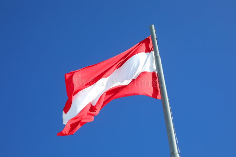 Austrian Flag in White and Red Colors Waving Against a Blue Sky Stock ...