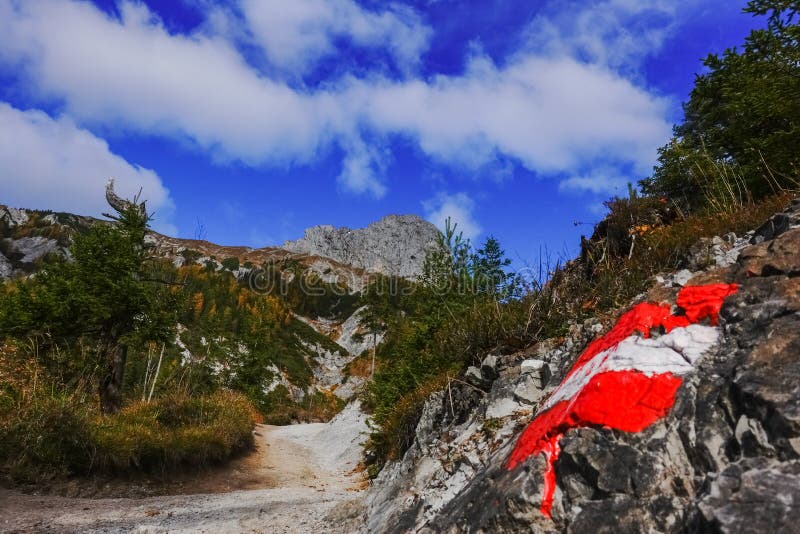 Hiking Mark on Rocks Near a Sandy Hiking Path in the Mountains Stock ...