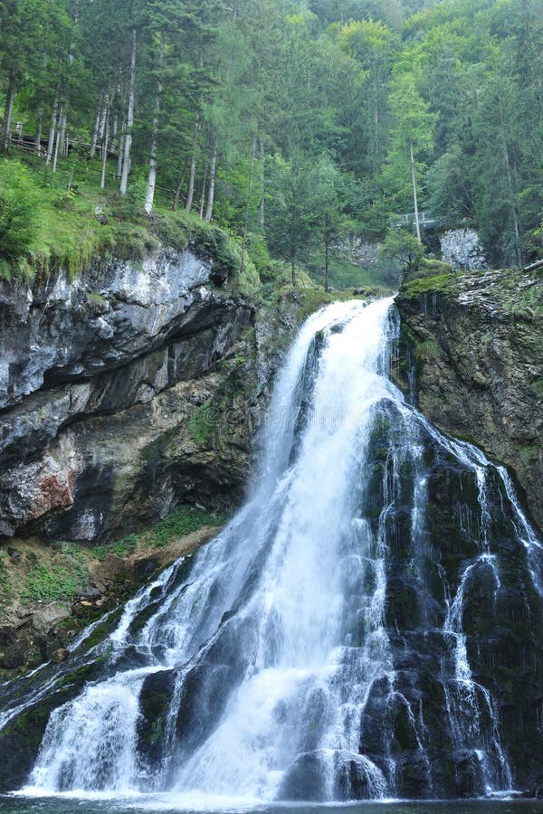 An Austrian Waterfall in a Forest Stock Image - Image of hill, fjord ...