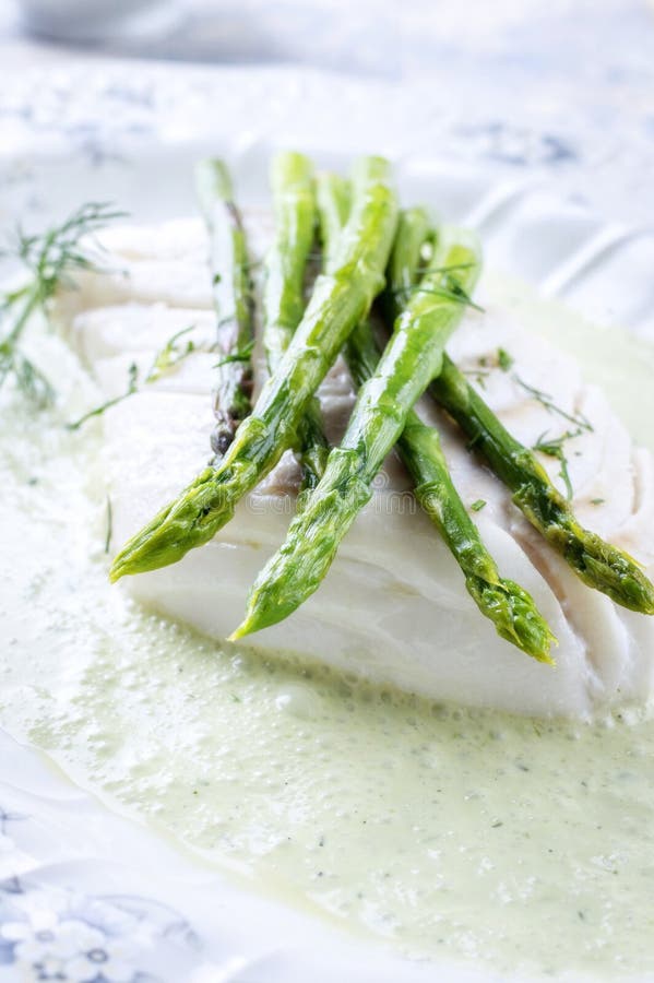 Authentic Codfish Filet with Green Asparagus in Asparagus Creme Soup in ...
