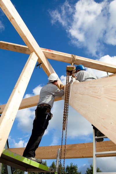 Authentic Construction Workers Stock Image - Image of hoist, plank ...