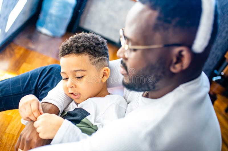 Authentic Ethnic Multicultural People in Living Room Day Sunlight Stock ...